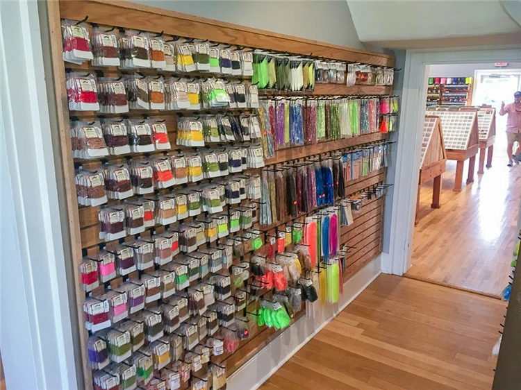 Optimize Your Fishing Shop Layout with Reel Wheel Displays