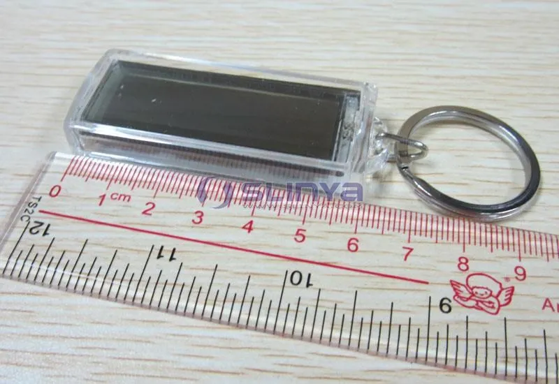DIY Keychain Solar Blinking LCD Logo Display