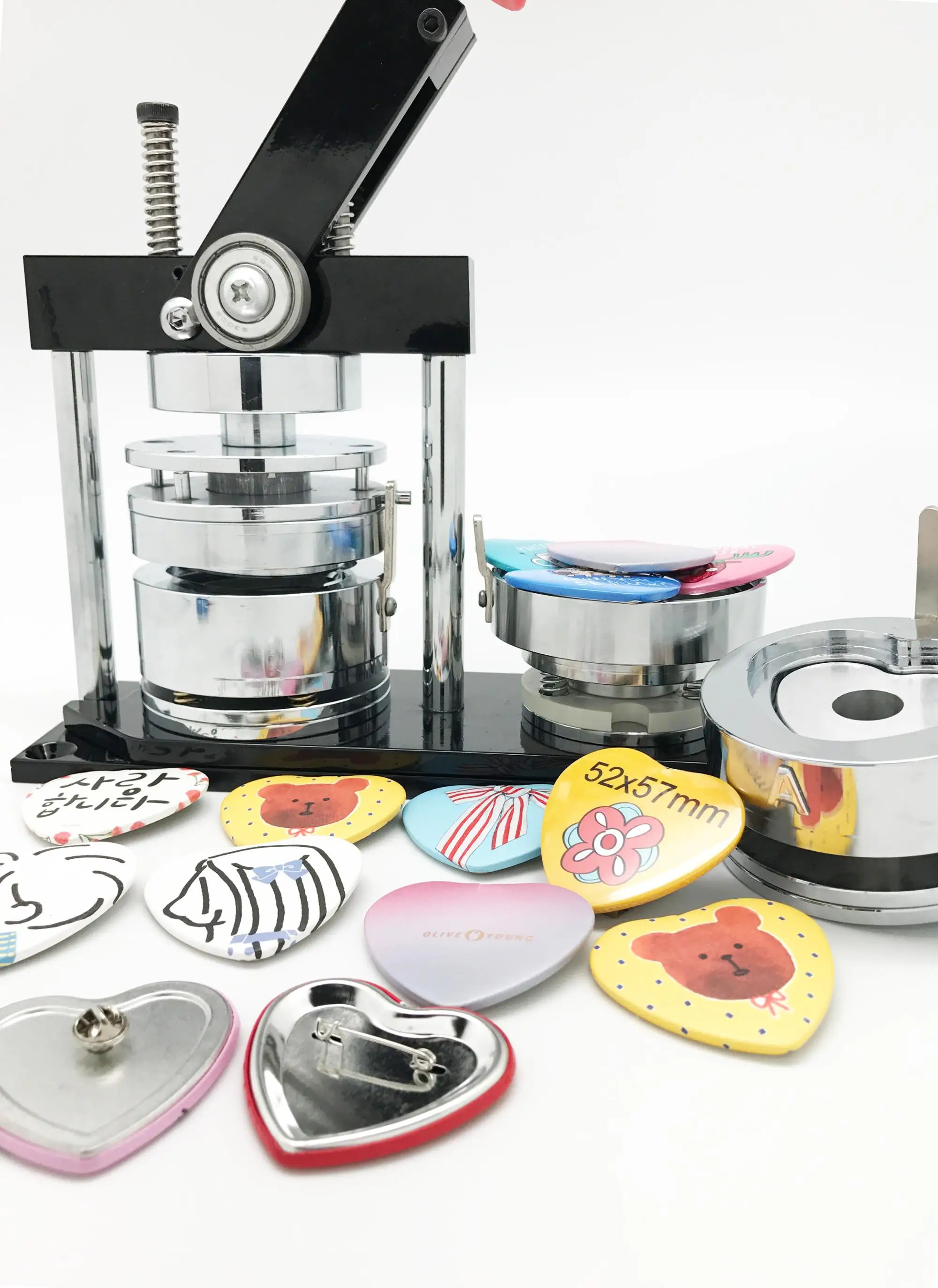 China Hot Sale Heart Manual Button Maker Badge Machine