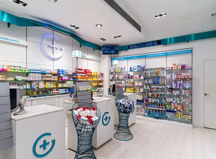 Capsule Shape Wooden Display Counter Design For Branded Pharmacy Shop ...