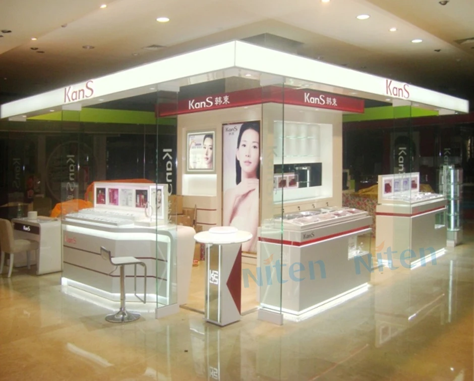 Escaparate de exhibición de isla cosmética moderna y soporte de ...